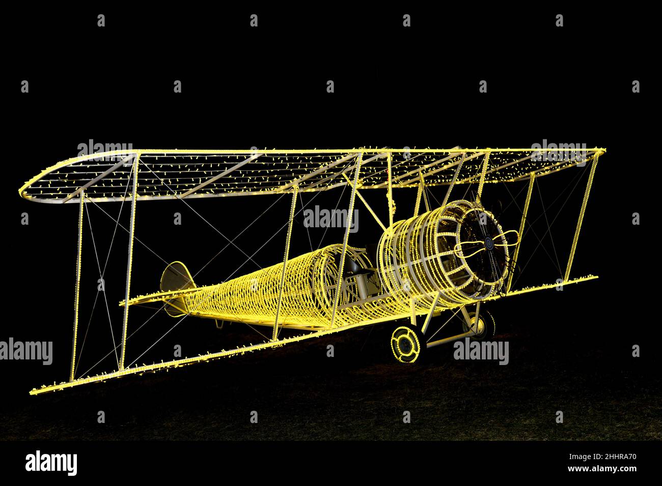 stylized model of a vintage biplane aircraft illuminated with led ...