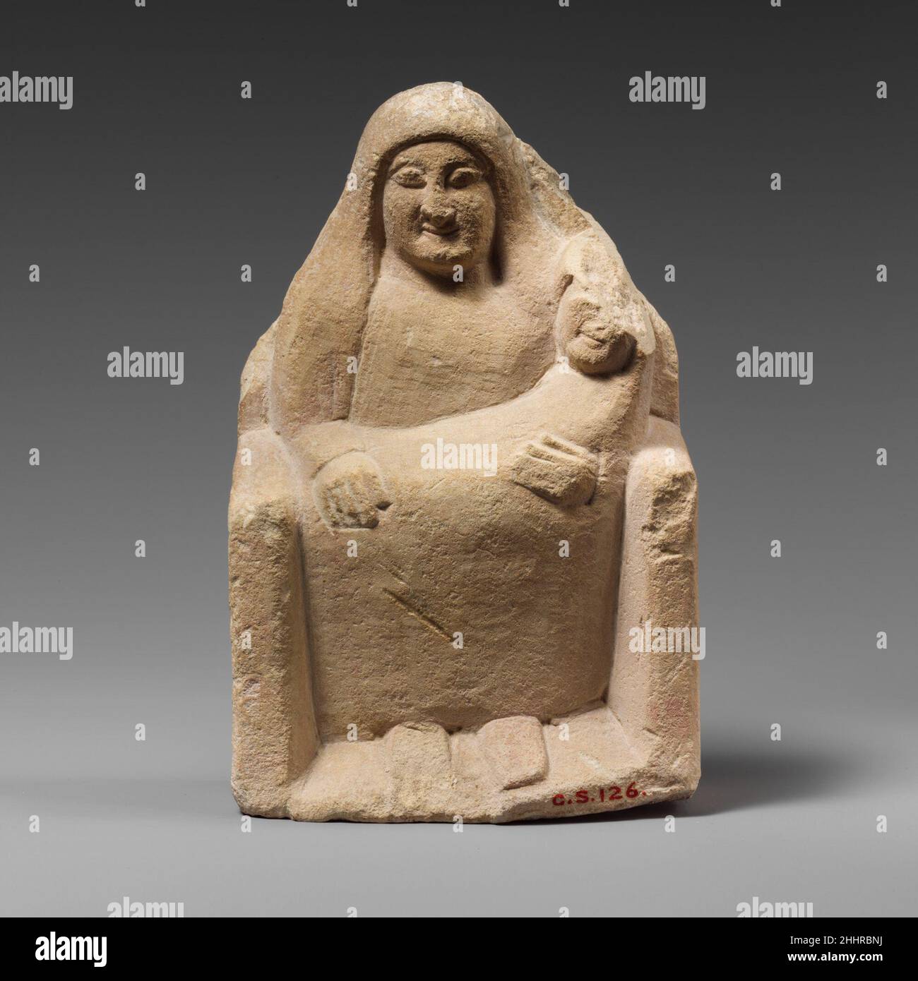 Seated limestone kourotrophos late 6th or early 5th century B.C ...
