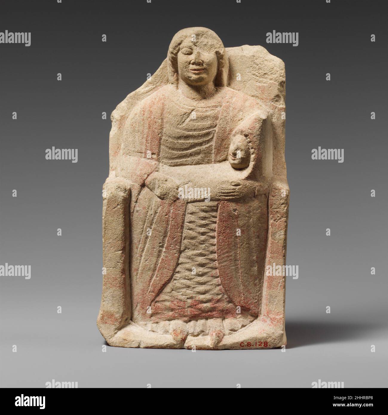 Seated limestone kourotrophos 2nd half of the 6th century B.C. Cypriot ...