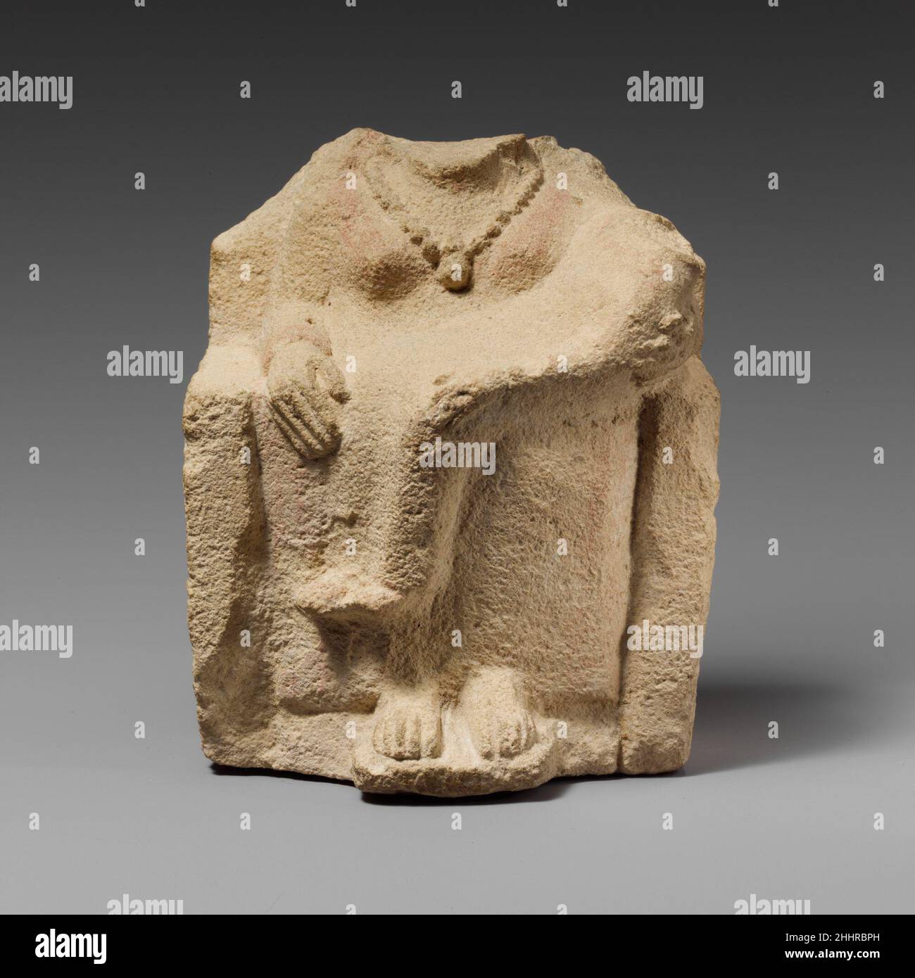 Seated limestone kourotrophos 2nd half of the 5th century B.C. Cypriot ...