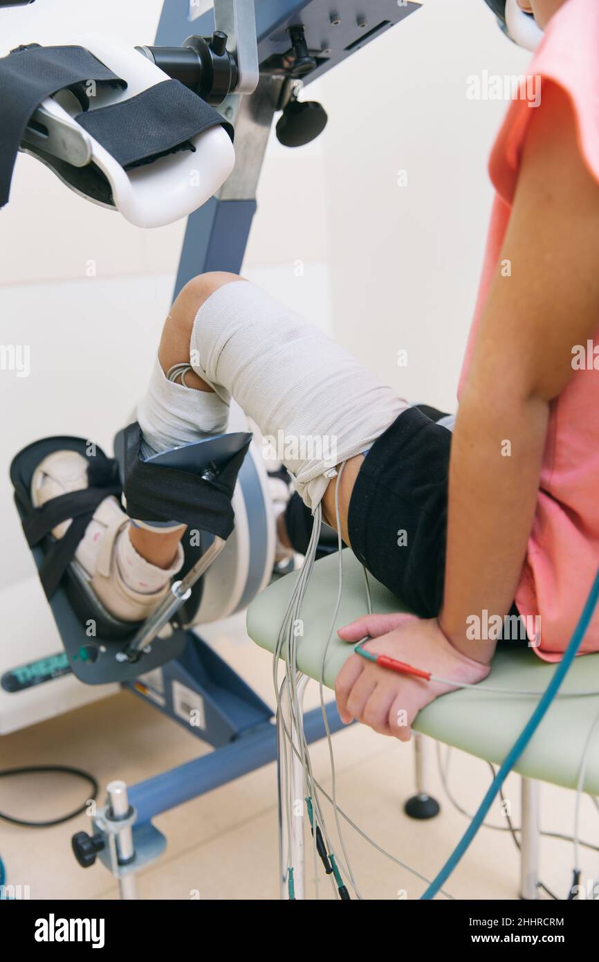 Patient on Continuous Passive Range of Motion machines. Device to ...