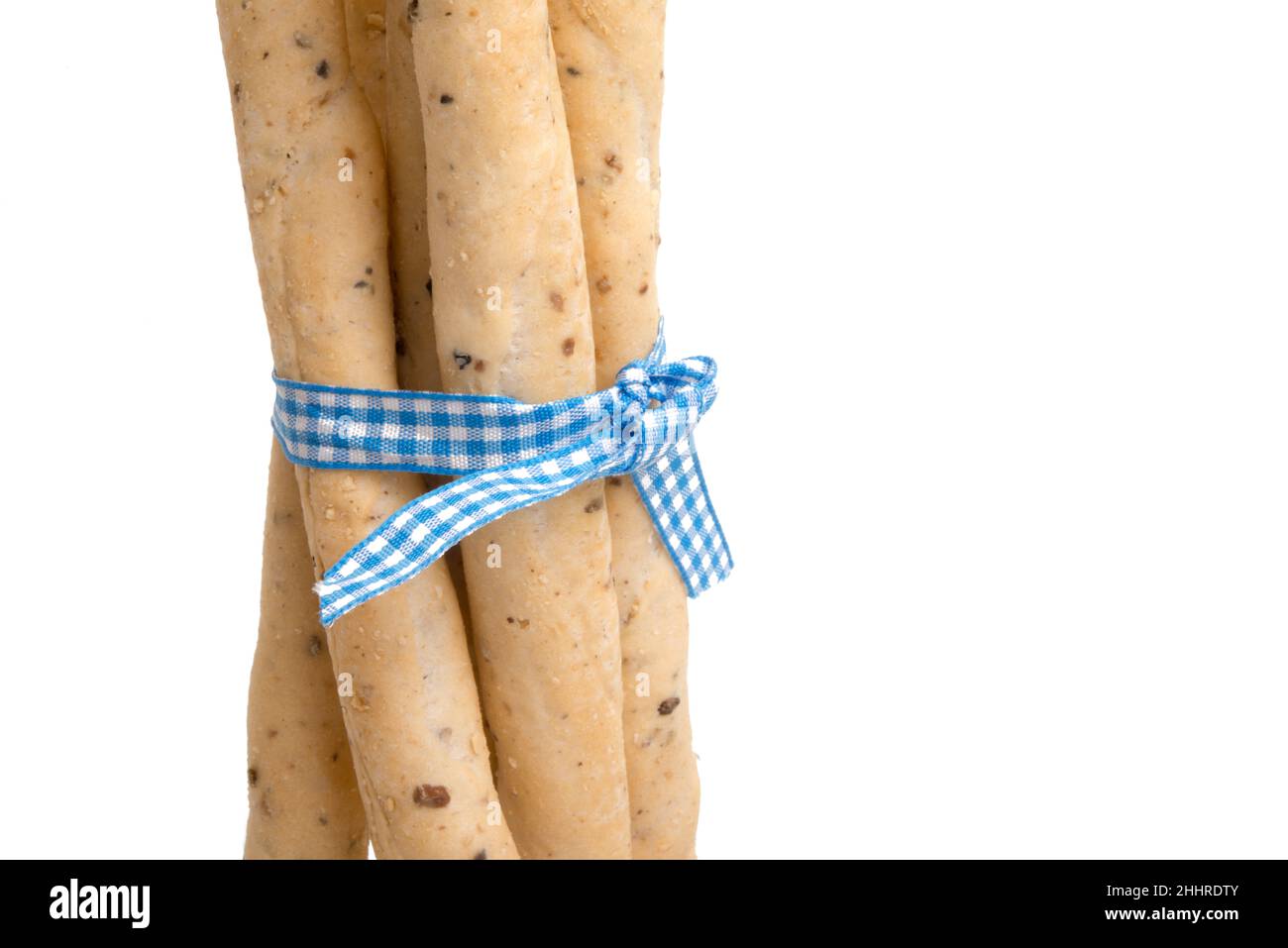 Bread sticks italian snack with blue ribbon isolated on the white Stock ...