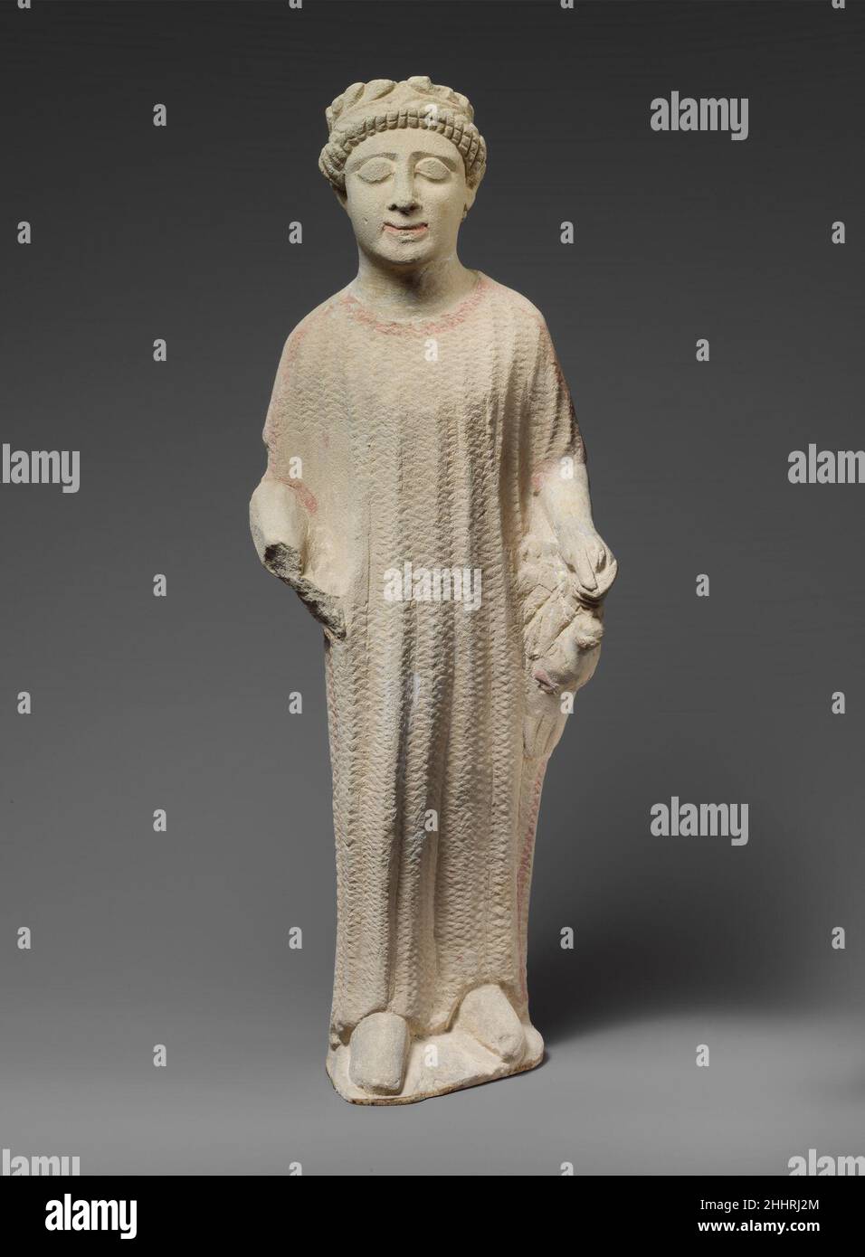 Limestone statuette of a boy holding a dove 2nd half of the 5th century ...