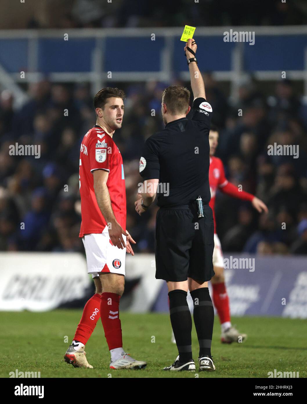Charlton Athletic's Ben Purrington is shown a yellow card by referee ...
