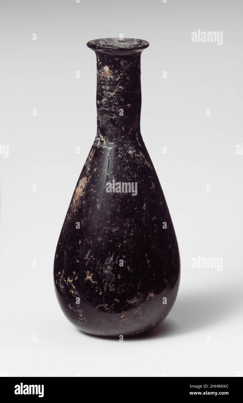Glass perfume bottle 1st century A.D. Roman Translucent deep purple ...
