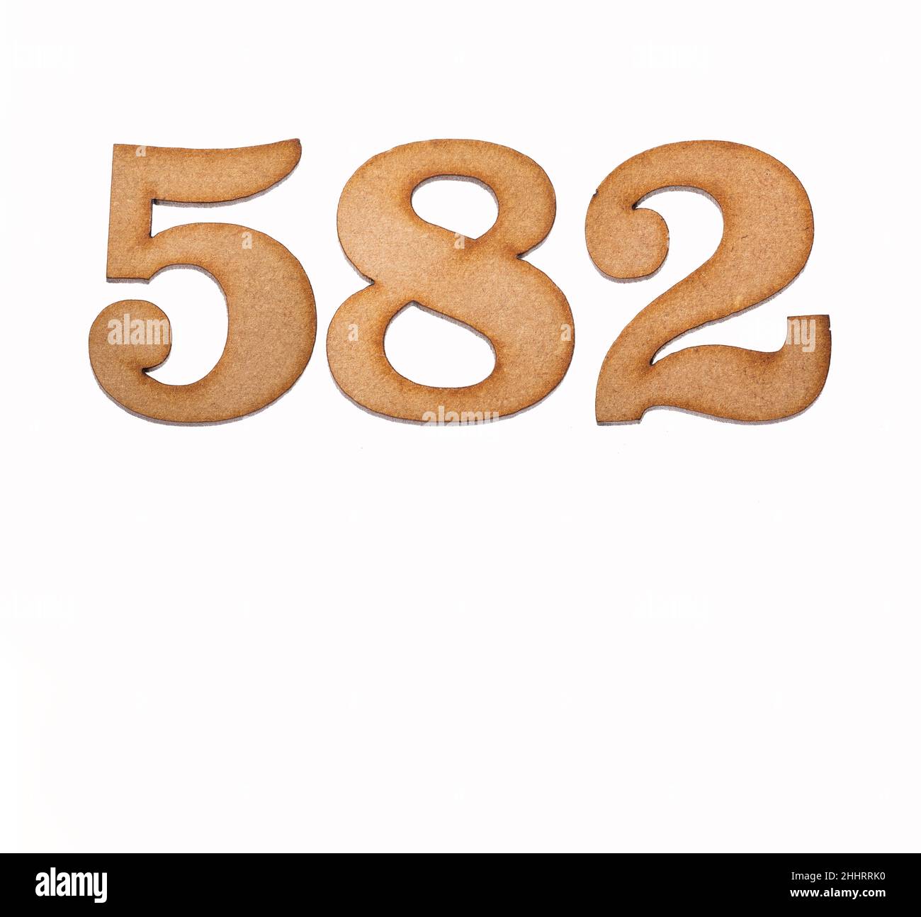 Number 582 - Piece of wood isolated on white background Stock Photo - Alamy