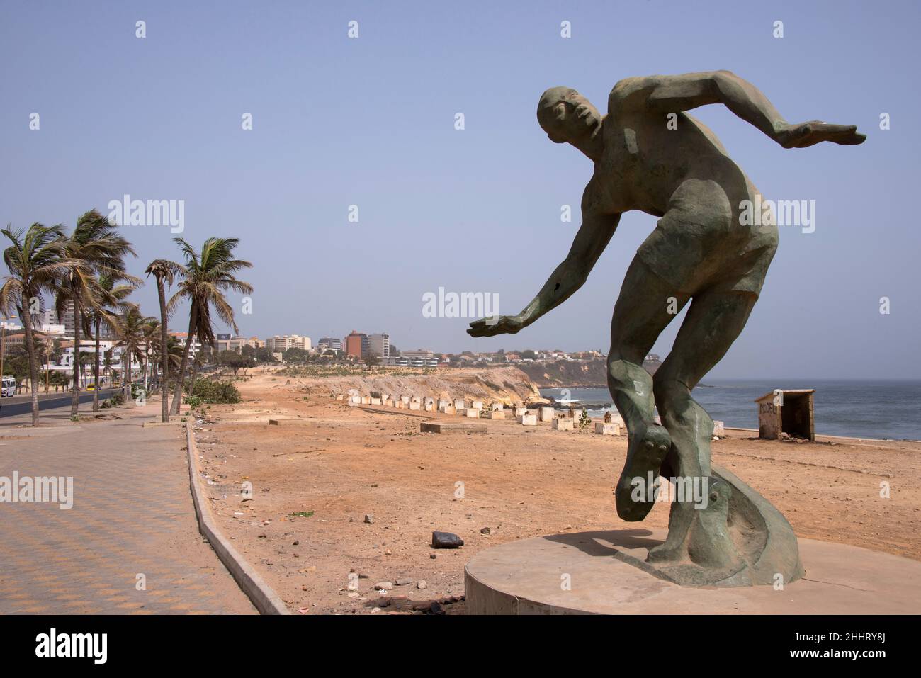 Sculpture of a running athlete on the coast of the West Corniche in ...