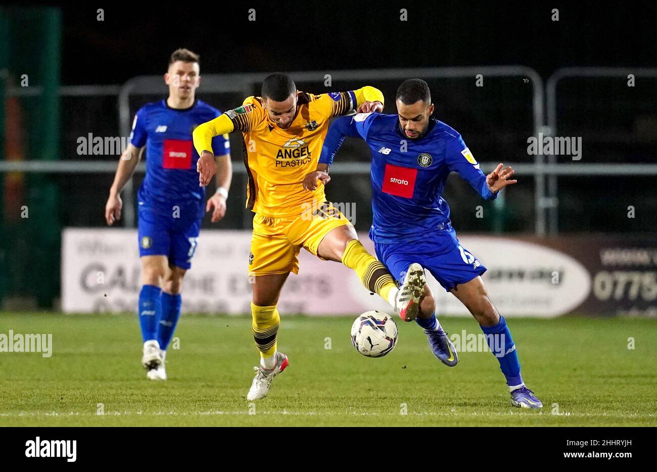 Sutton United's Craig Eastmond (left) and Harrogate Town's Warren ...