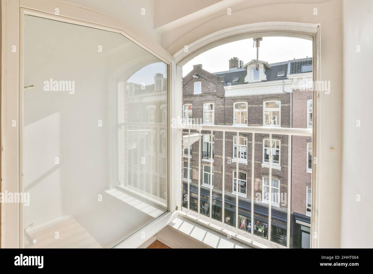 street view from a large white window Stock Photo - Alamy
