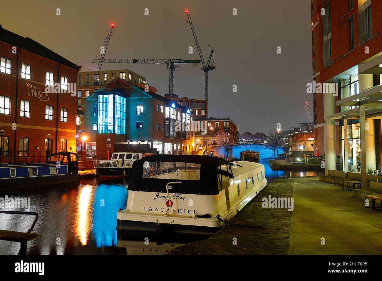 Moored boats on the canal at Granary Wharf in Leeds City Centre. 3 ...