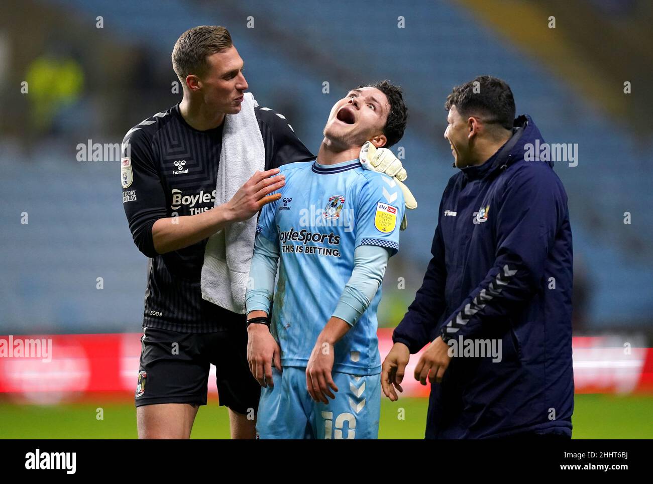 Coventry City goalkeeper Simon Moore (left), Callum O'Hare and Gustavo ...