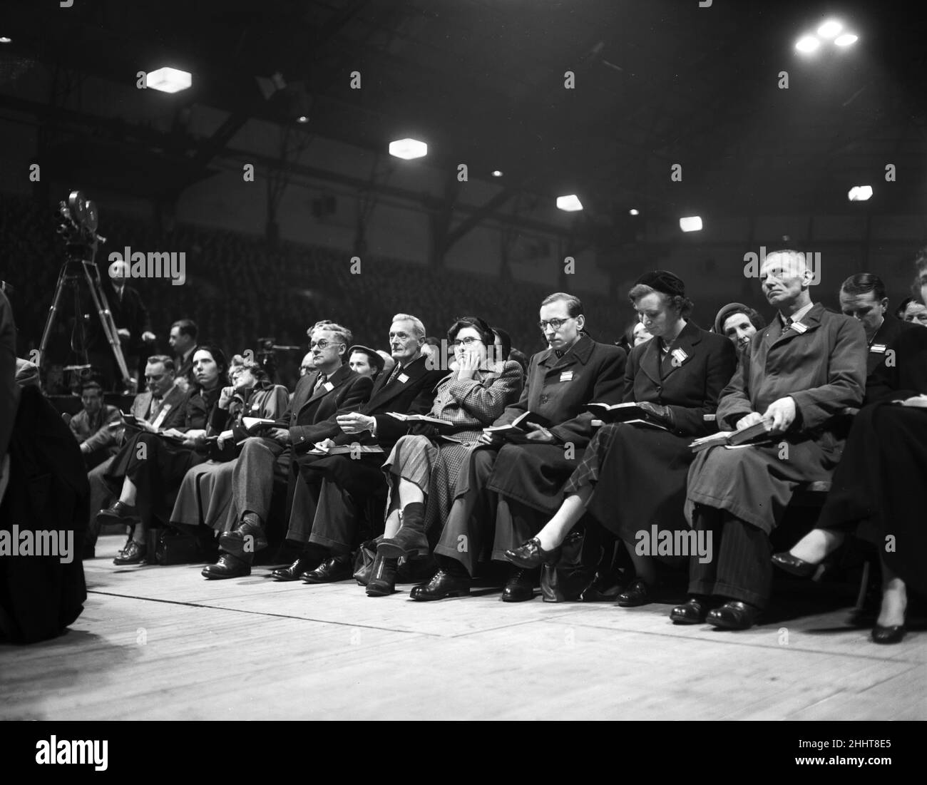 American evangelist Billy Graham speaks to the crowd at the Harringay ...