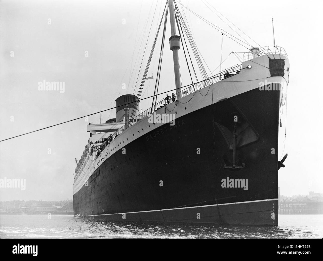 The RMS Mauretania brought up the Thames to King George V Dock at ...