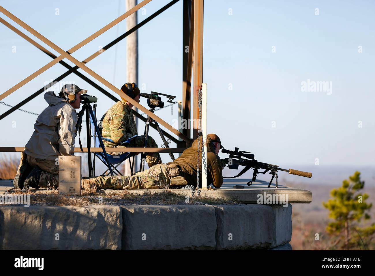 A sniper takes aim at Pinnacle Mountain range Dec. 6 during the 51st ...