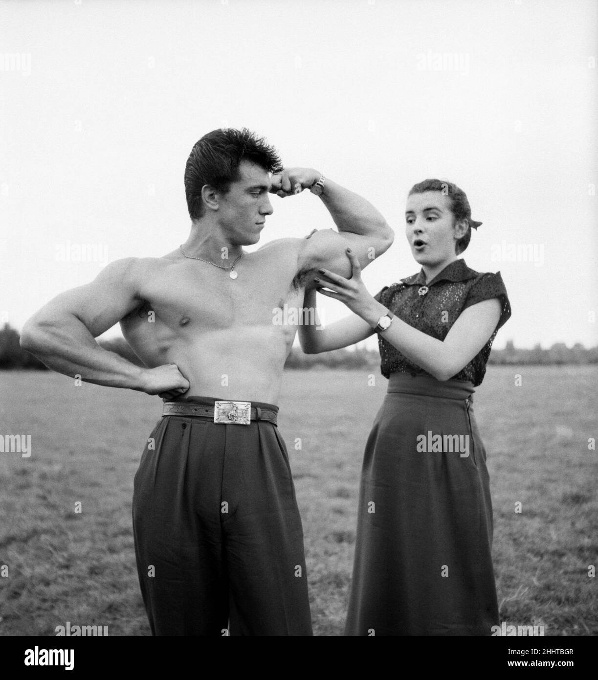 Strongman Spencer Churchill seen here posing by the Pool with Gloria ...