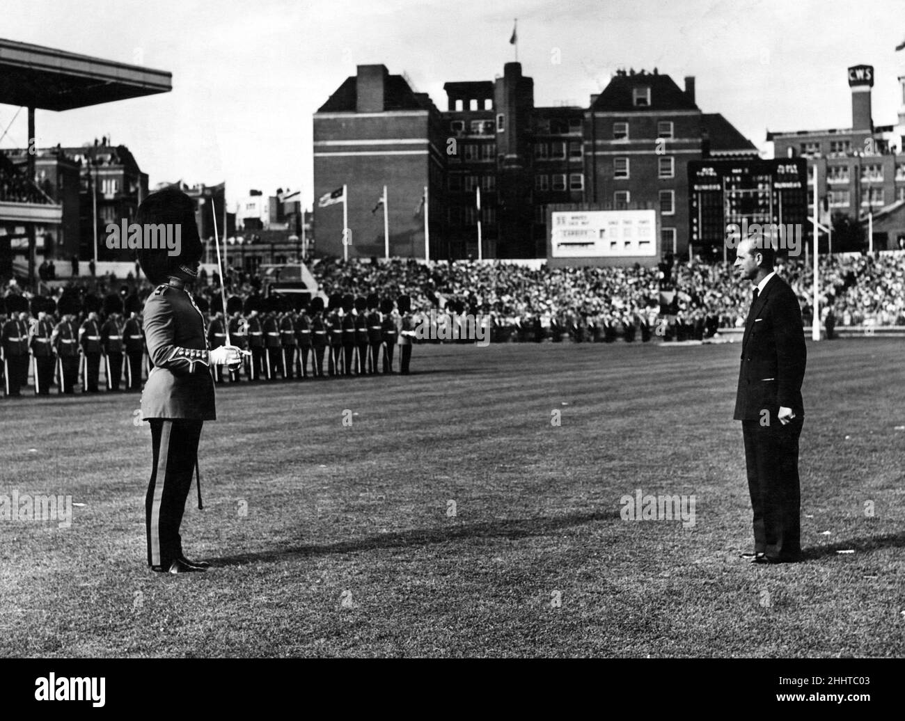 HRH the Duke of Edinburgh is saluted by an officer of the Welsh Guards ...