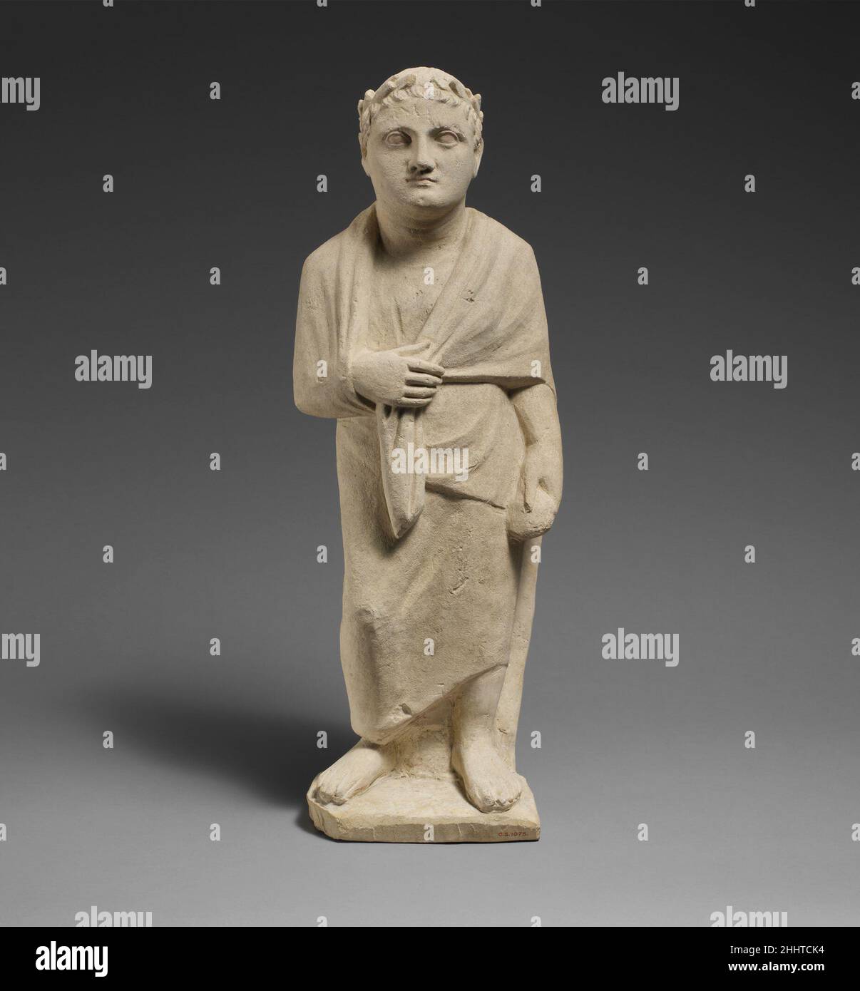 Limestone statuette of a boy holding a pyxis 2nd–1st century B.C ...
