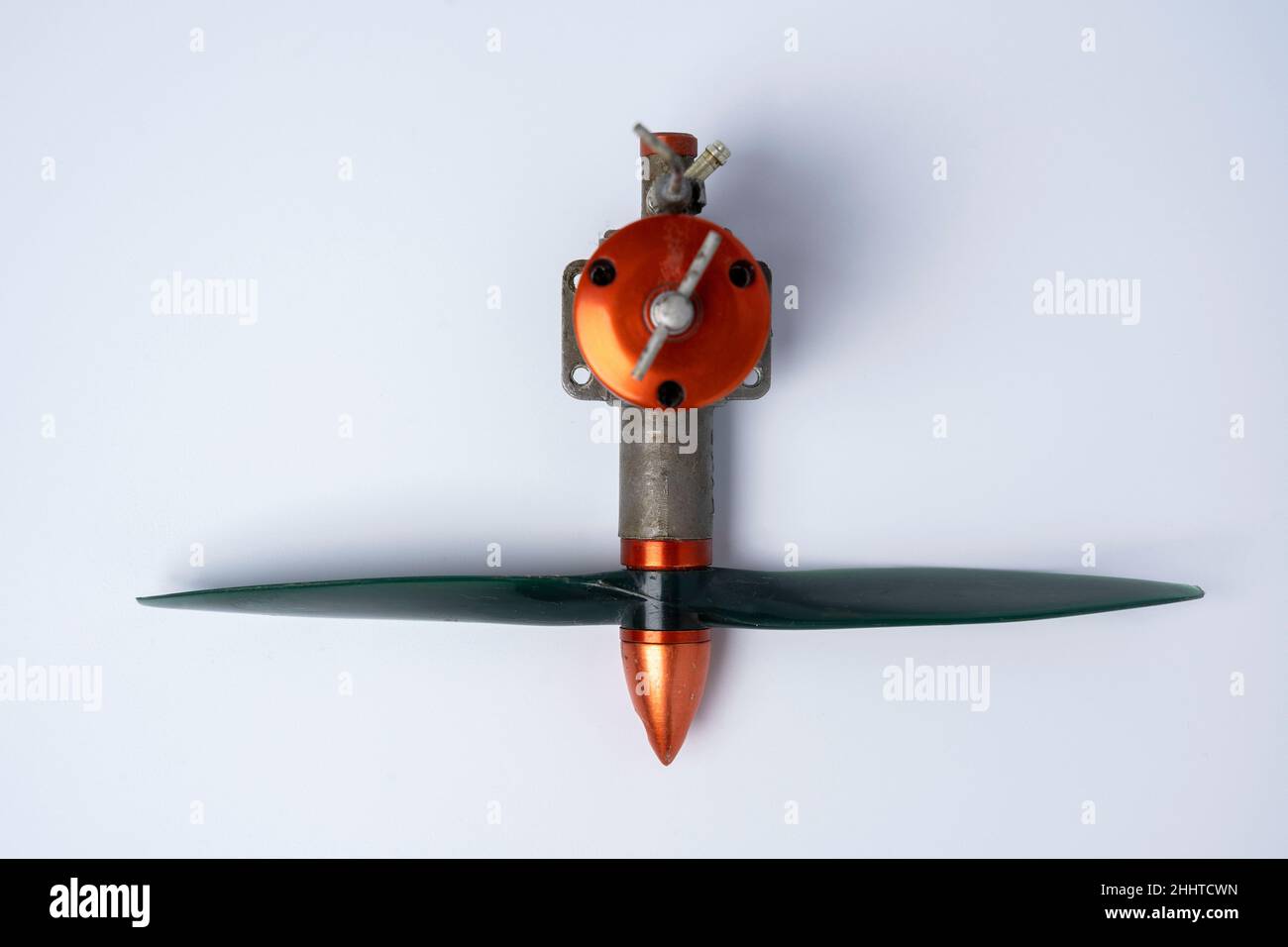 A small gasoline engine with a propeller for a controlled model of an ...