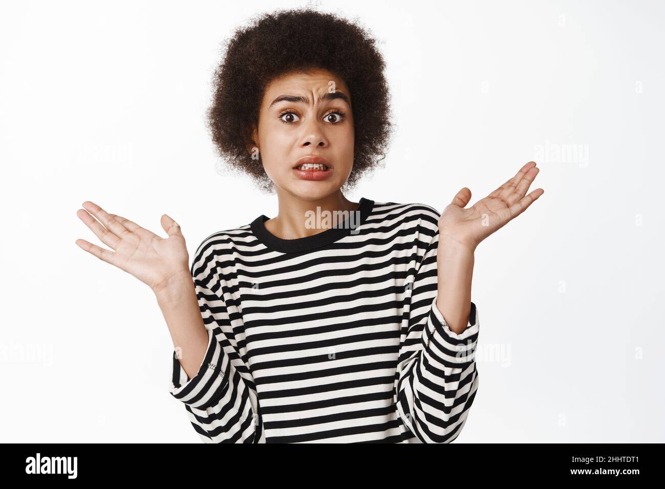 Woman Shrugging Shoulders