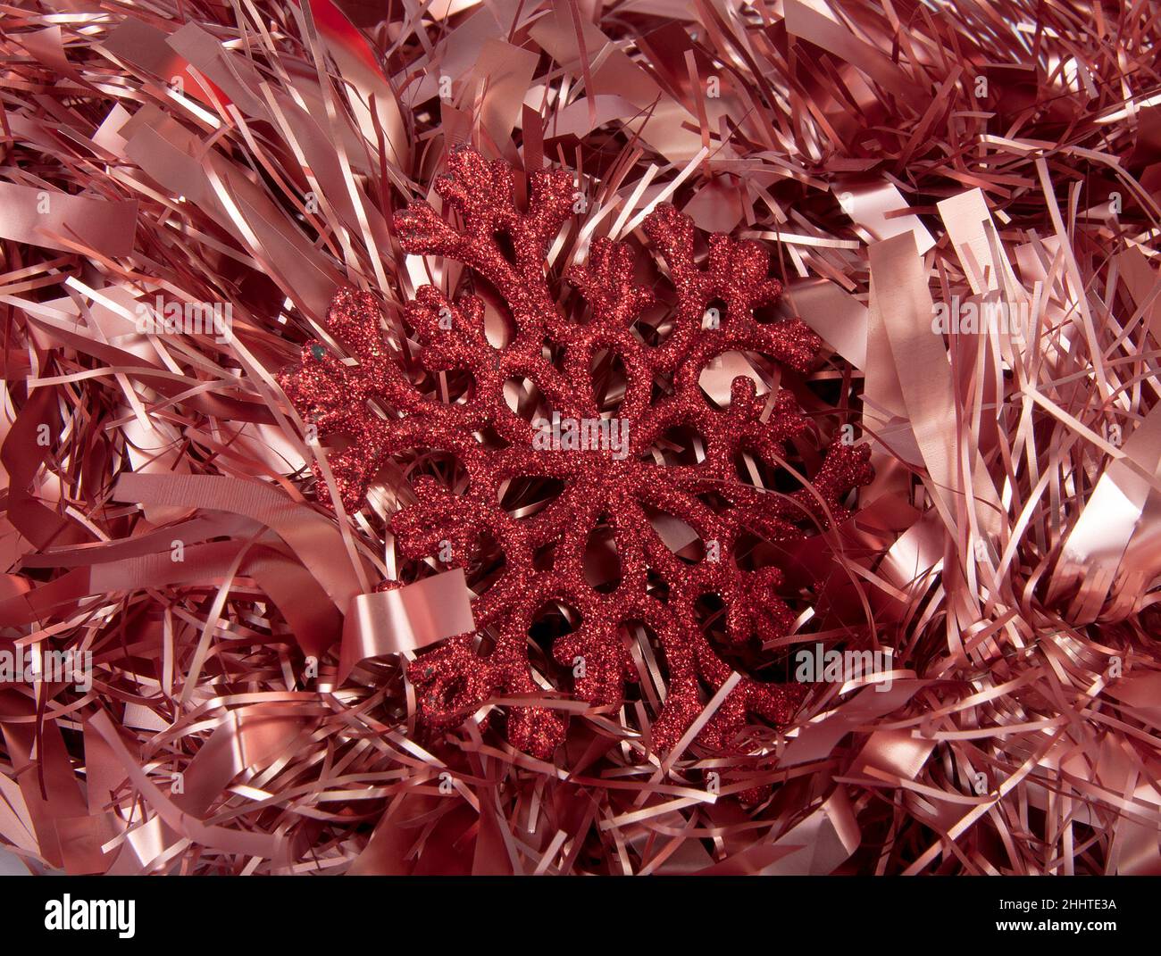 photo of red snowflake isolated on the white Stock Photo - Alamy