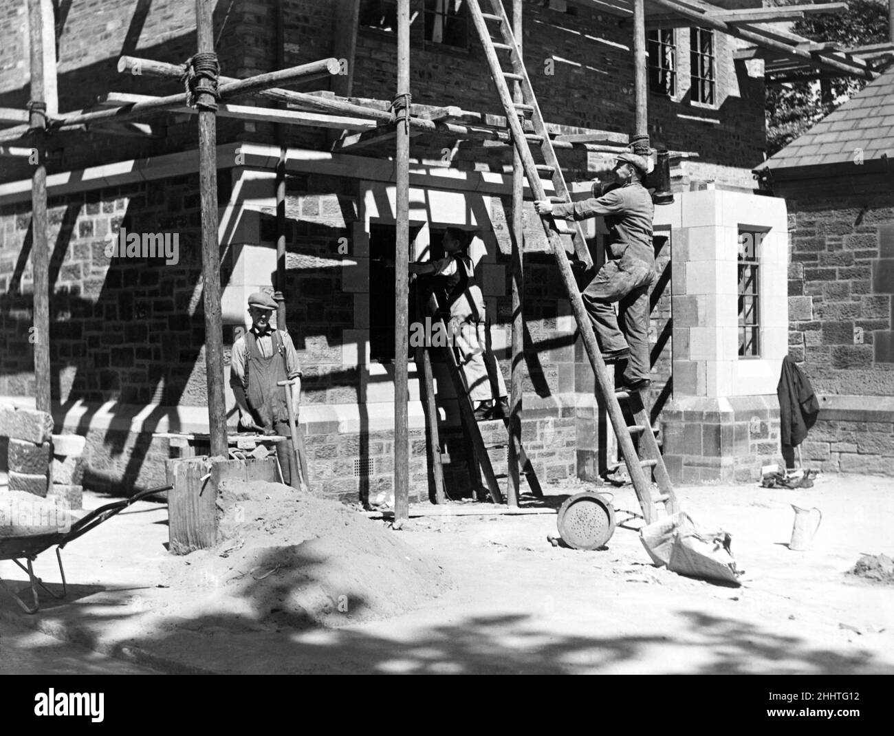 Bricklayers at work. August 1939 Stock Photo - Alamy
