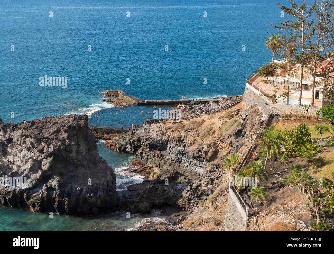 Los Gigantes, Tenerife - Crab Island beach and swimming pools Stock ...