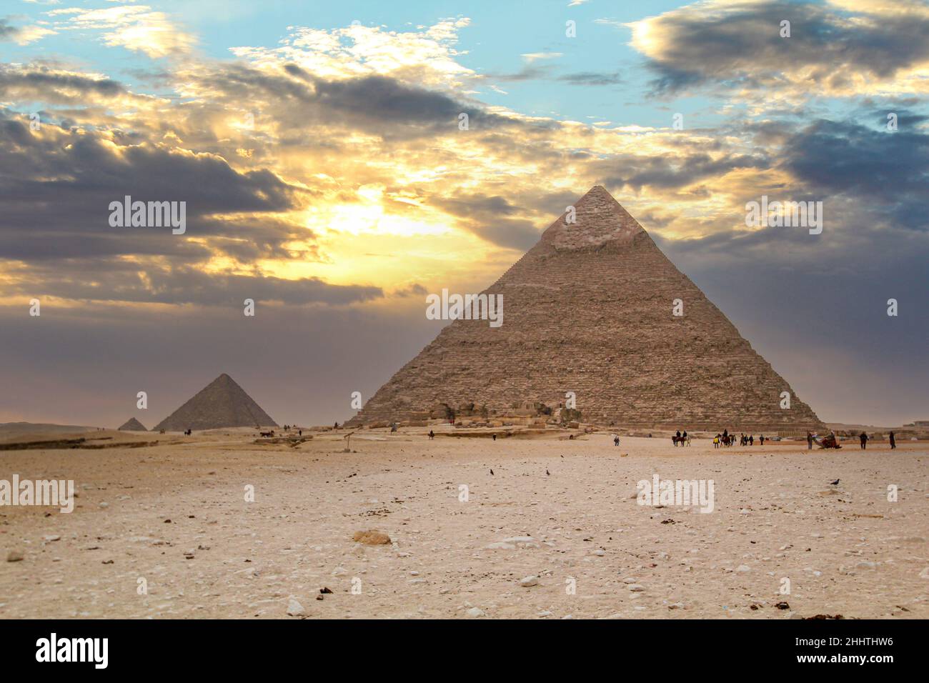 The Giza pyramids from the backside, a street leading to the pyramids ...