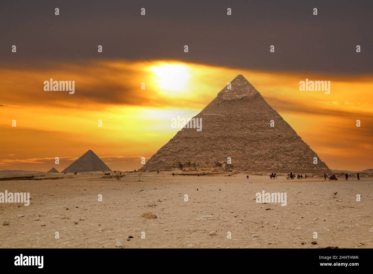 The Giza pyramids from the backside, a street leading to the pyramids ...