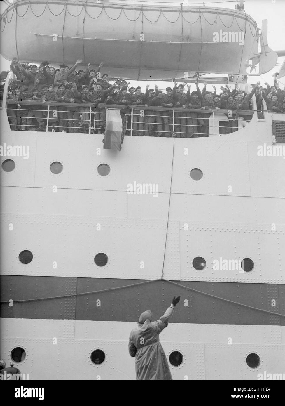 Mrs Buggins seen here waving off her son as the troopship Dunera sails ...