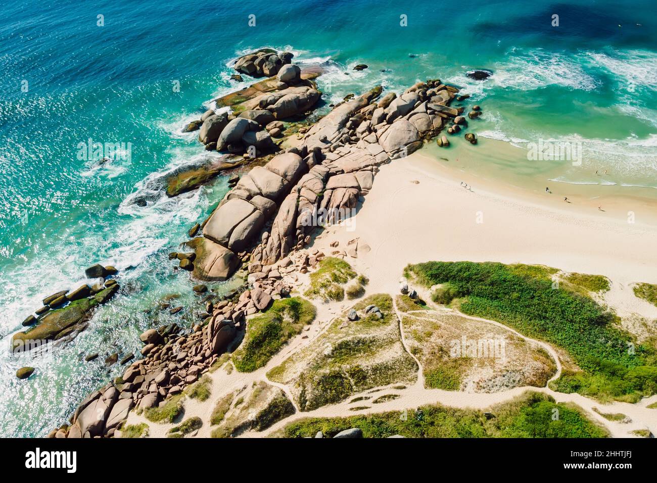 Coastline with Mole beach, rocks and ocean waves in Brazil. Aerial view ...