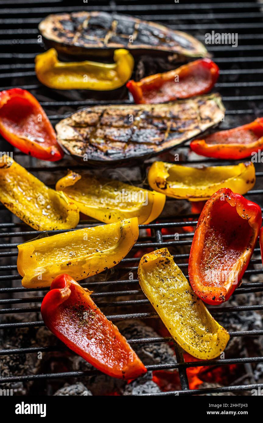 Grilled vegetables on barbecue, outdoor BBQ grill with fire. Top view ...