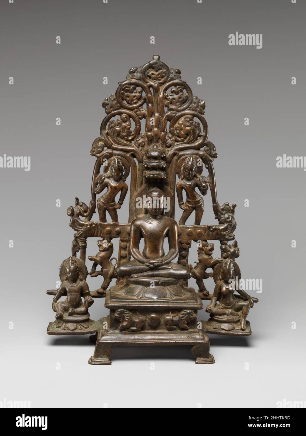 Enthroned Jina Attended by a Yaksha, a Yakshi, and Chauri-Bearers 9th ...