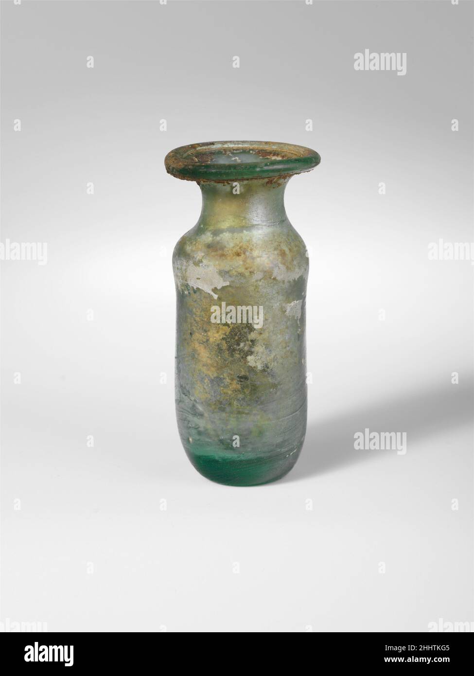 Glass bottle 1st–2nd century A.D. Roman Translucent greenish blue.Broad ...