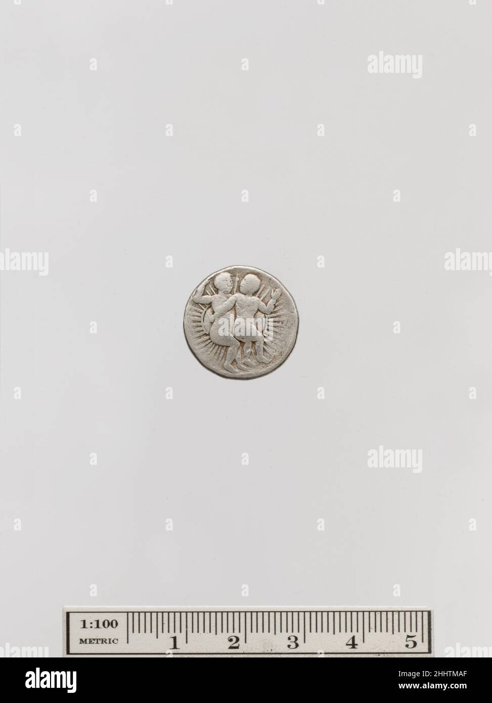 Coin with Gemini Zodiac Sign dated A.H. 1027/ A.D. 1618 This coin bears ...