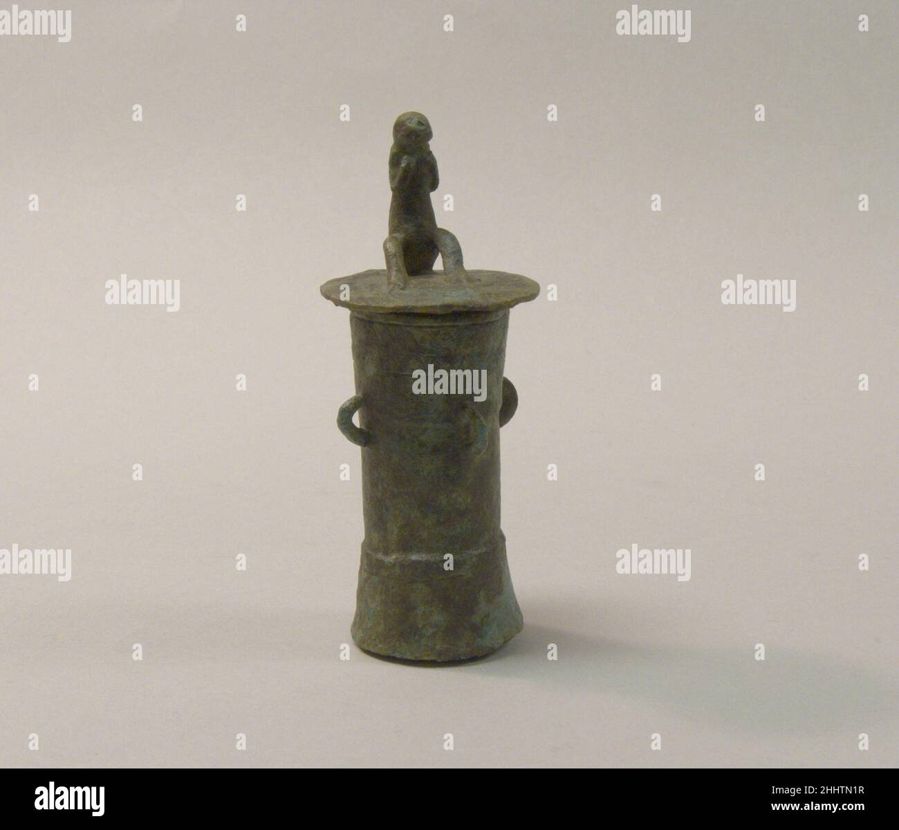 Lime Container in the Form of a "Mloko" Drum Surmounted by a Crouching ...
