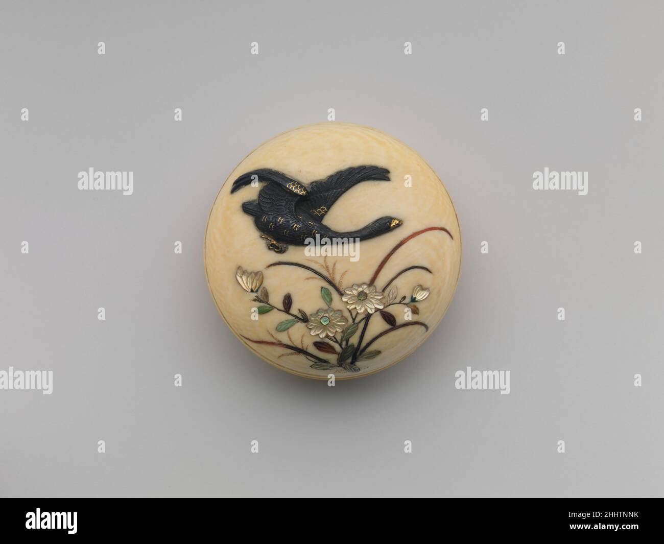 Netsuke of Flying Goose over Flowers 19th century Japan On the obverse ...
