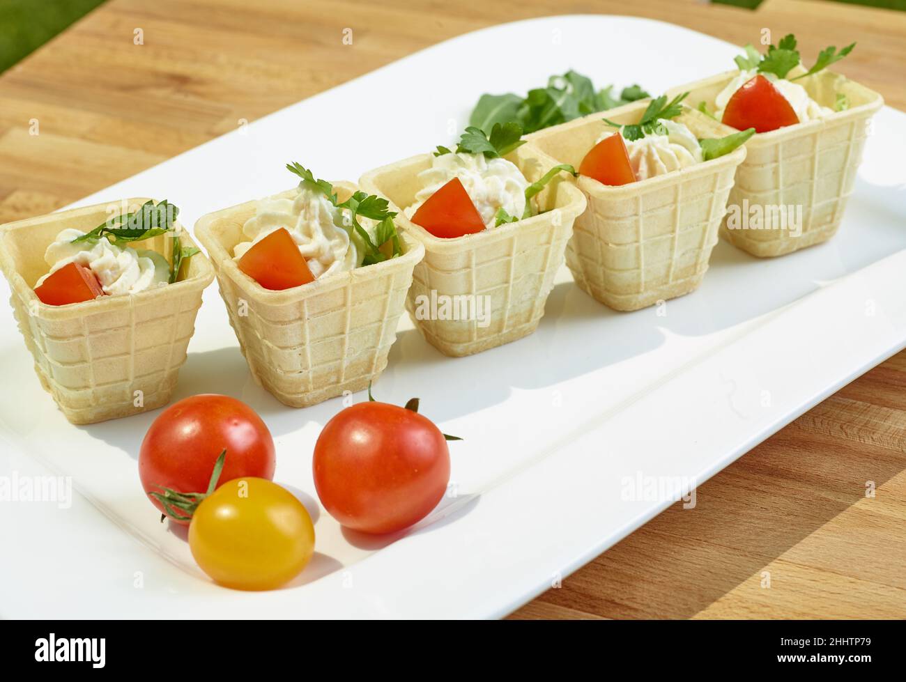 Salad of roe seasoned with tomato and lemon Stock Photo - Alamy