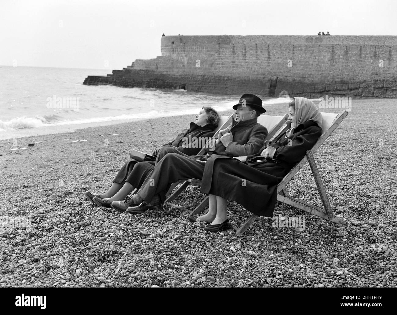 A family have the whole beach to themselves during a visit to the beach ...
