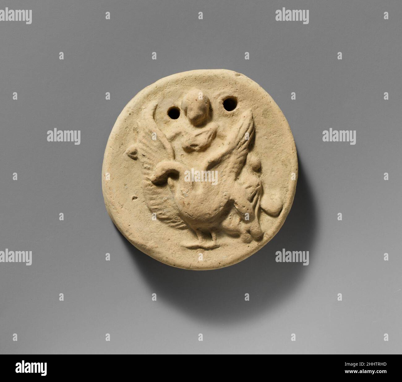 Terracotta disk with Aphrodite riding on a swan 4th century B.C. Greek ...