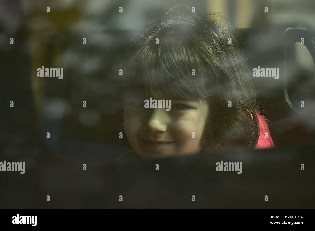 Car behind child hi-res stock photography and images - Alamy