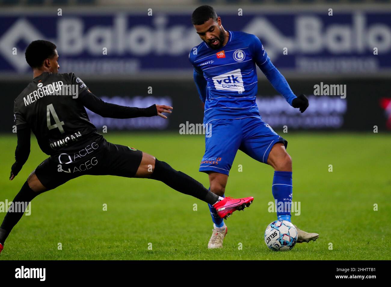 GENT, BELGIUM - JANUARY 25: Christopher Operi of KAA Gent and Kyle ...