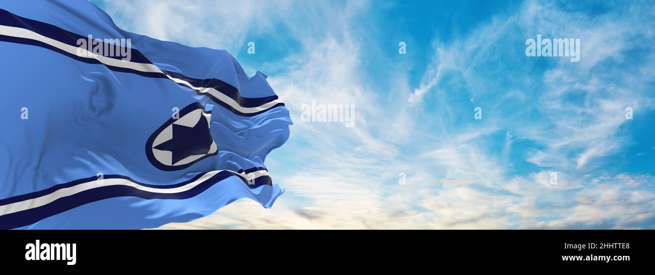 flag of Air Force Ensign , Israel at cloudy sky background on sunset ...