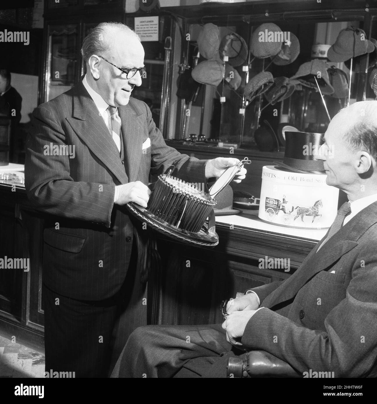 Milliner measuring hat hi-res stock photography and images - Alamy