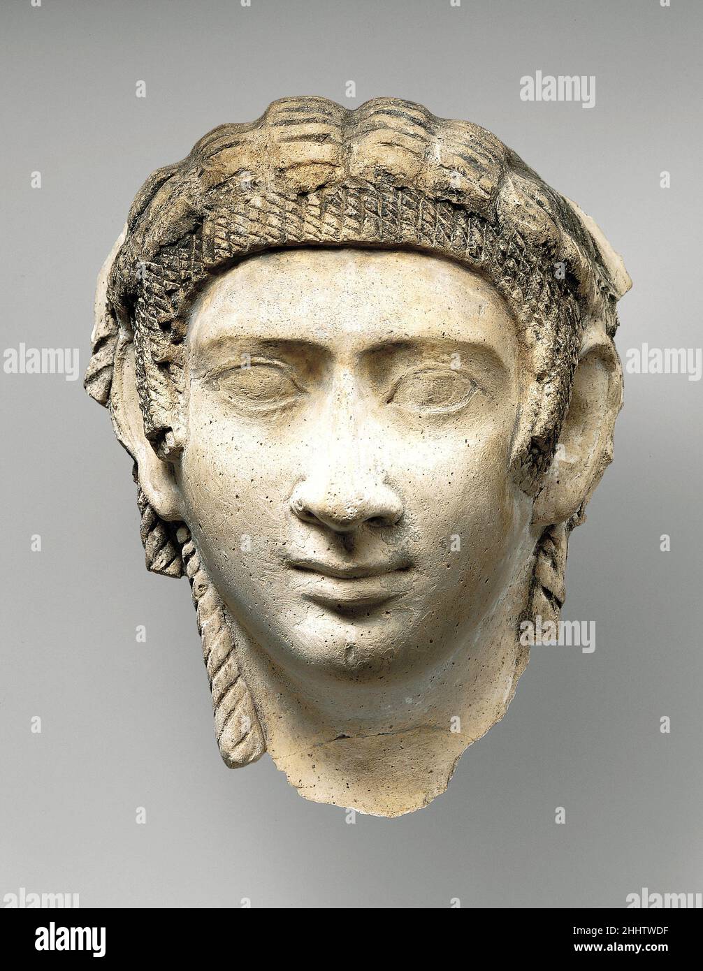Mask of a woman with corkscrew locks and bang A.D. 50–150 Roman Period ...