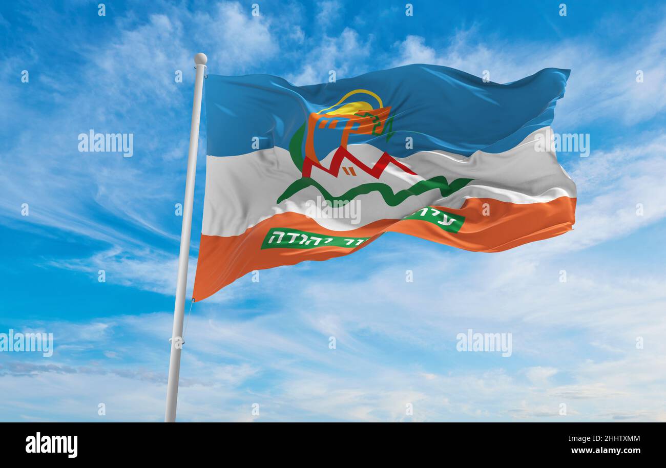 flag of Or Yehuda , Israel at cloudy sky background on sunset ...