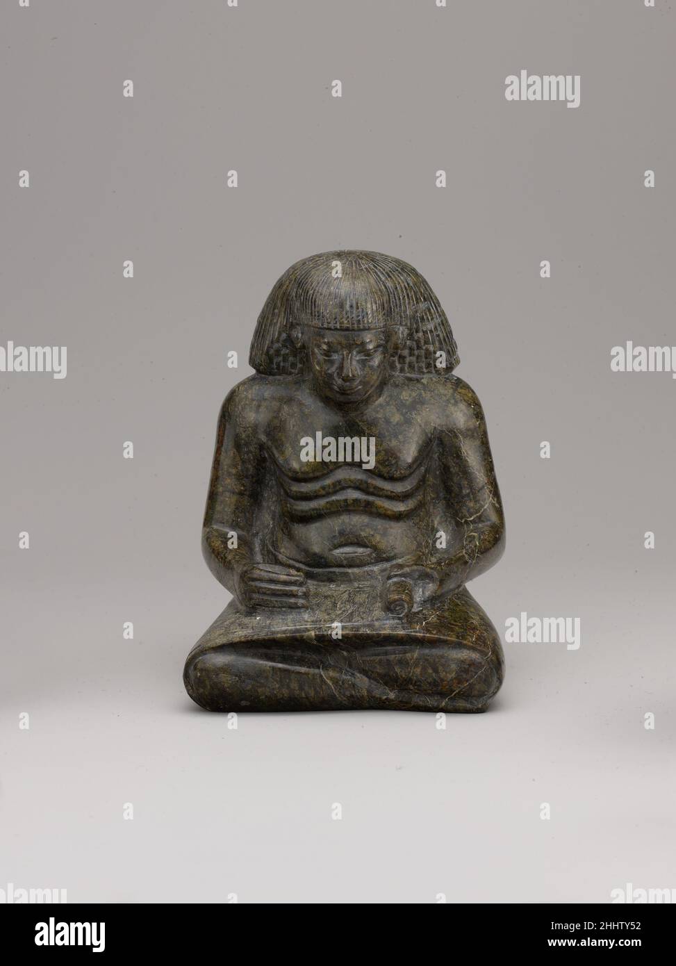 Statuette of a Scribe ca. 1391–1353 B.C. New Kingdom This statuette ...