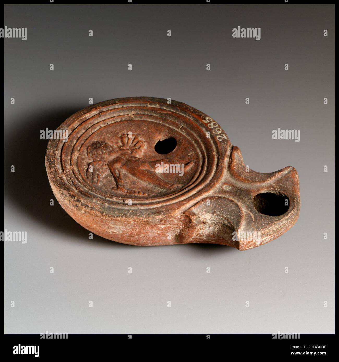 Terracotta oil lamp ca. A.D. 70–100 Roman Loeschcke Type 1B. Mold-made ...