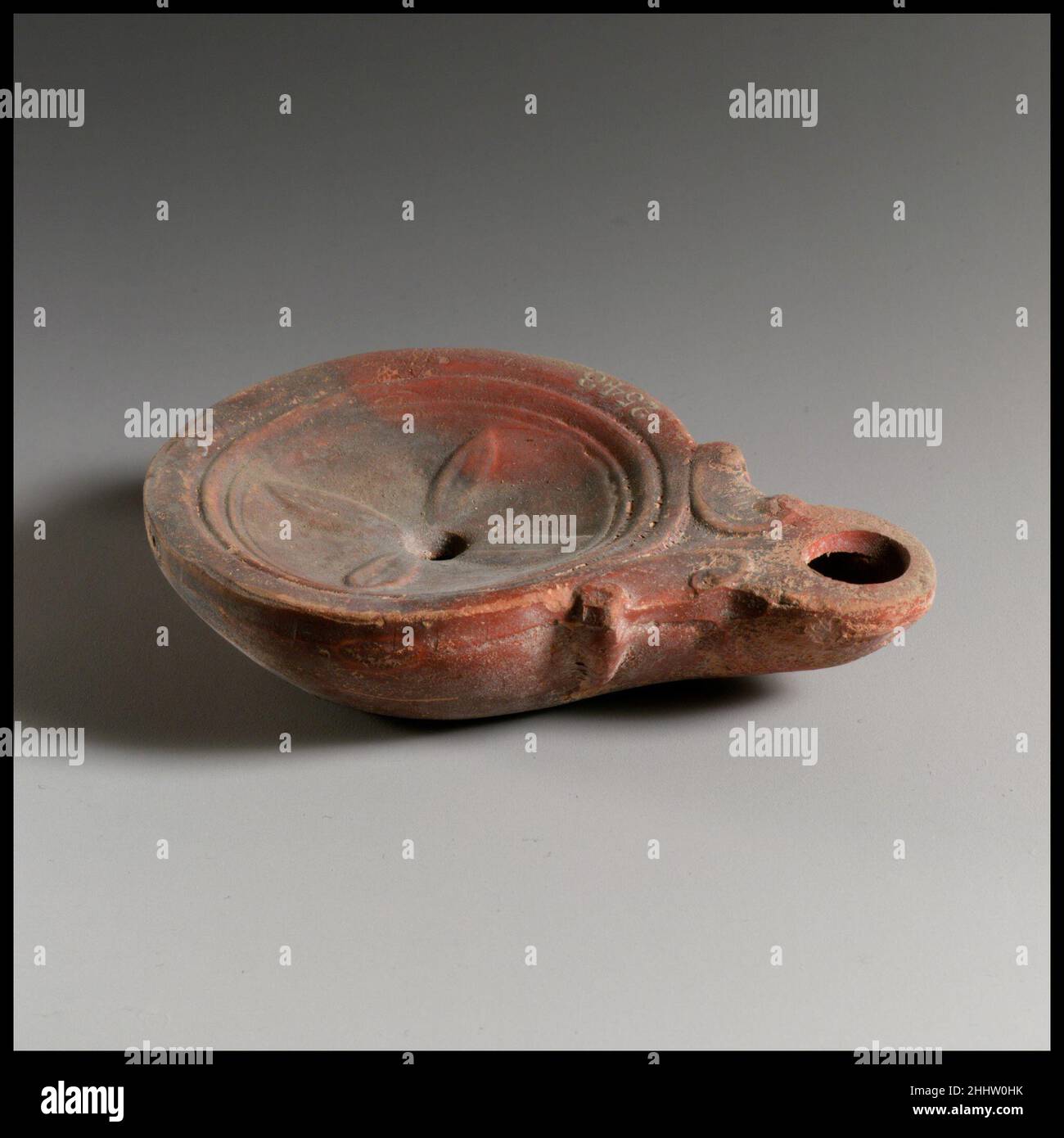 Terracotta oil lamp ca. A.D. 40–100 Roman Loeschcke Type 4. Mold-made ...