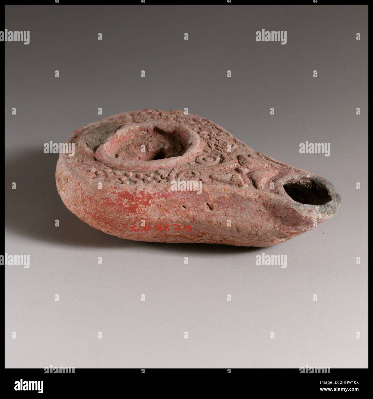 Terracotta oil lamp 3rd century A.D. Roman Mold-made, with ring ...