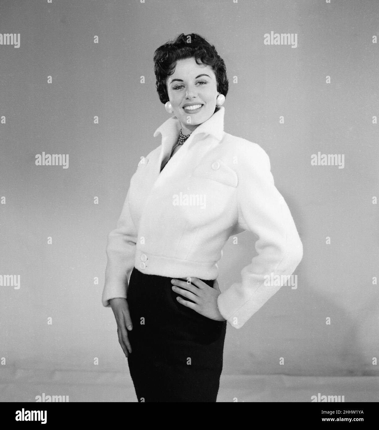 Eunice Gayson, actress and model, poses in a jacket for Sunday Mirror ...